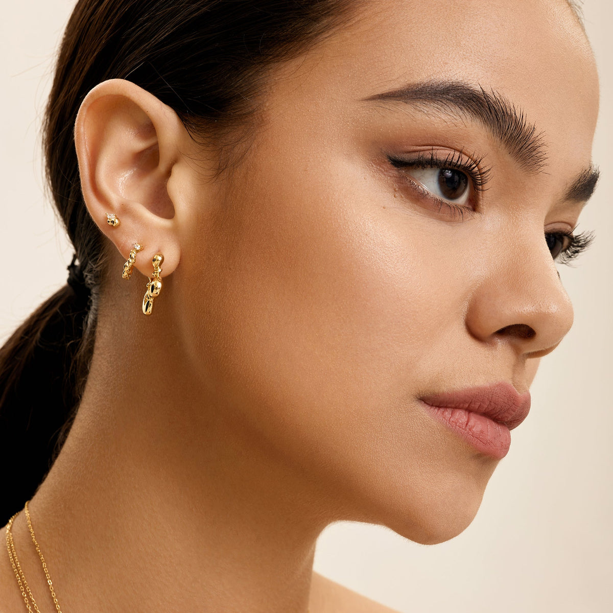 Gold Twisted Wave Huggie Hoop Earrings – Ania Haie US